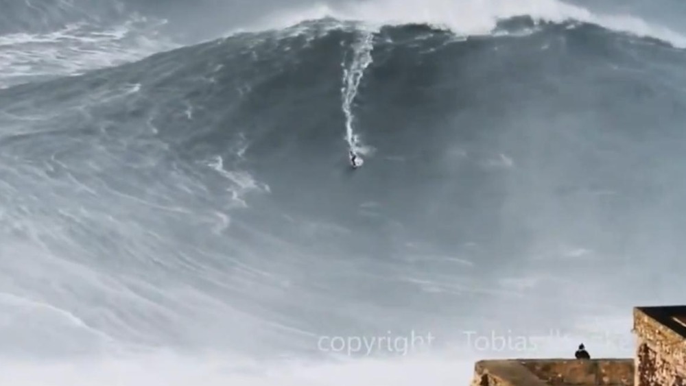 Surfer rides what could be a record breaking 100ft wave | ITV News