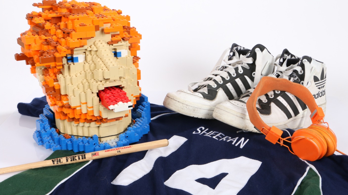 Ed Sheeran's toys, guitar and lego bust up for auction | ITV News Anglia