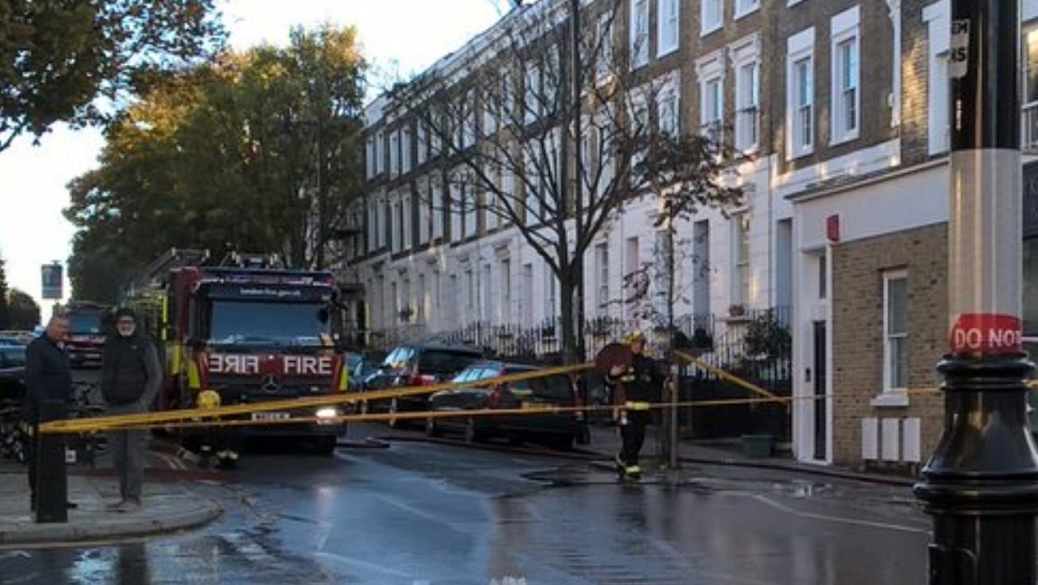 Fire crews hand out sandbags as water main bursts in Islington | ITV ...