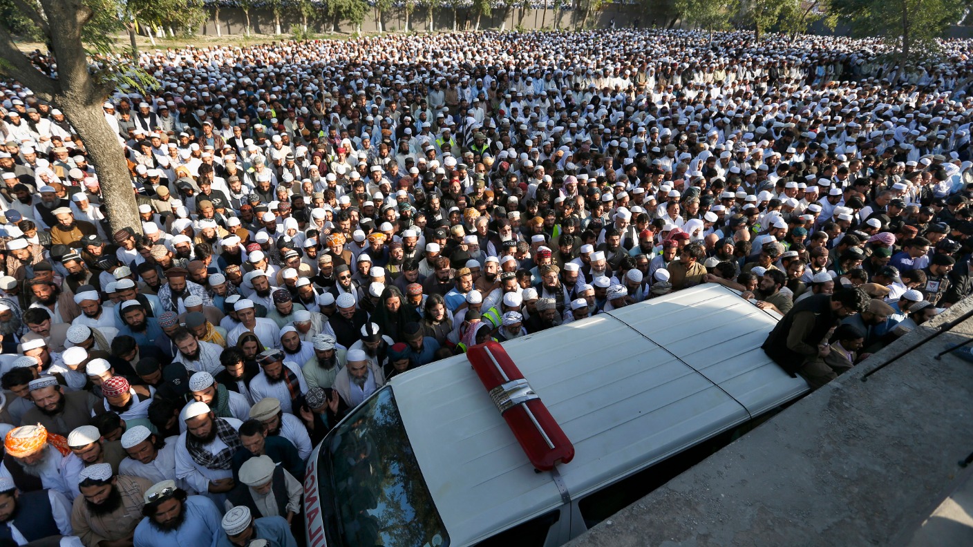 Thousands attend funeral in Pakistan of cleric known as 'Father of the ...