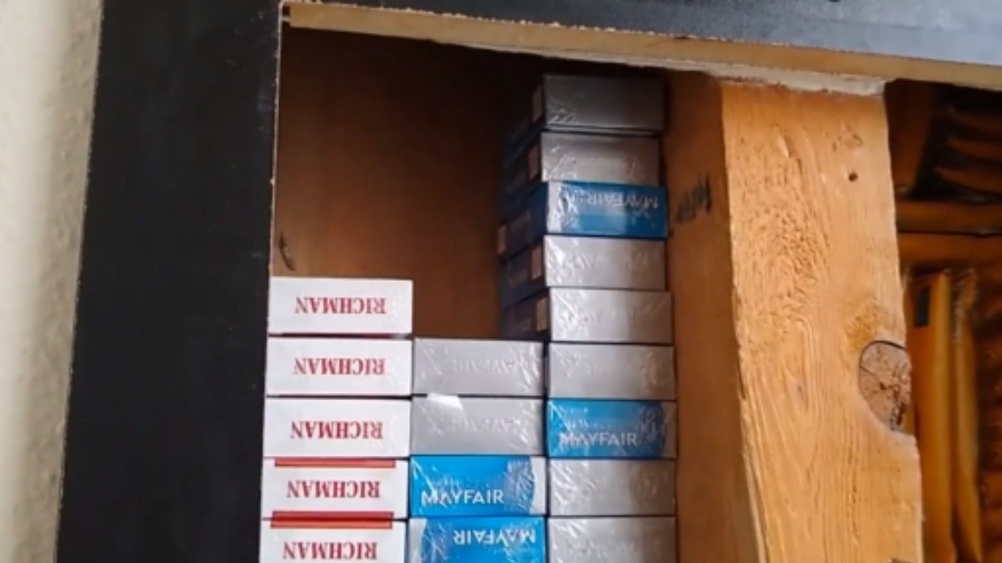 Hundreds of counterfeit cigarette packets found behind a mirror | ITV ...