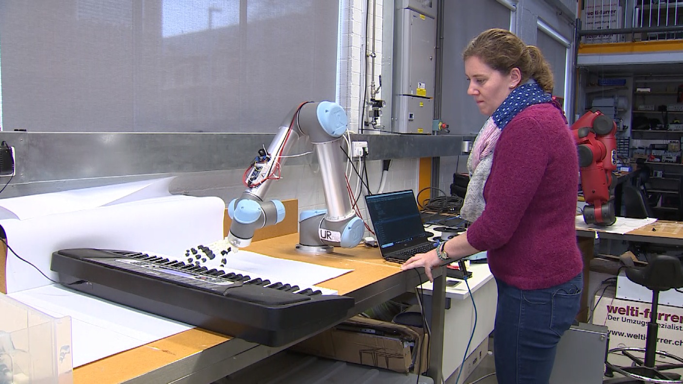 3D-printed robot hand plays festive tunes | ITV News Anglia