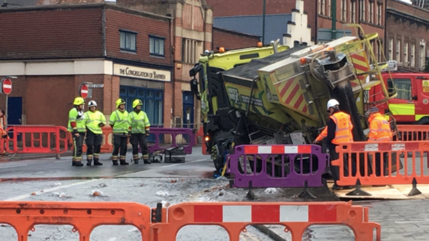 Pavement collapses under weight of concrete lorry | ITV News Central