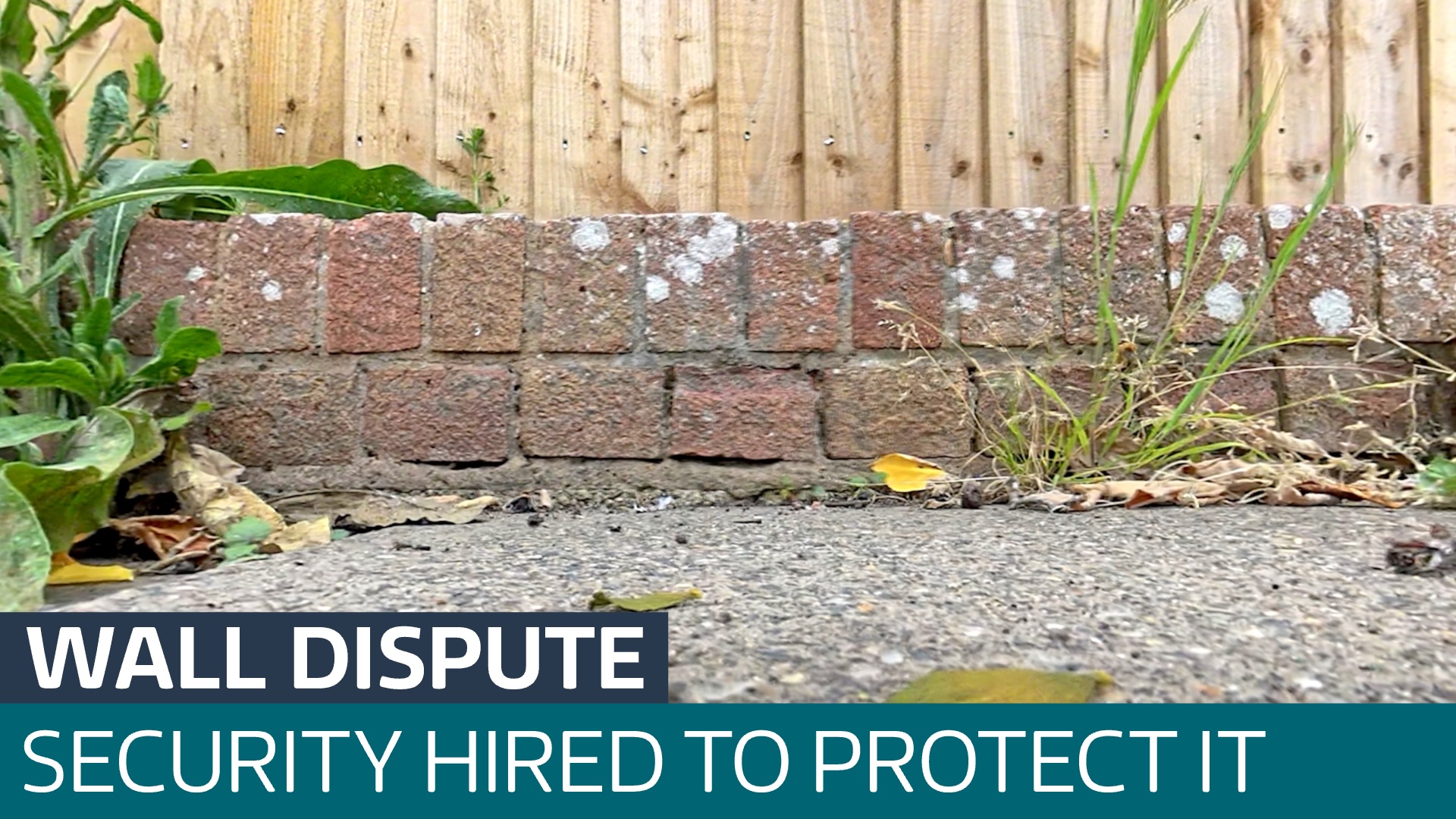 Security hired to protect brick wall, just over six inches high, at the ...