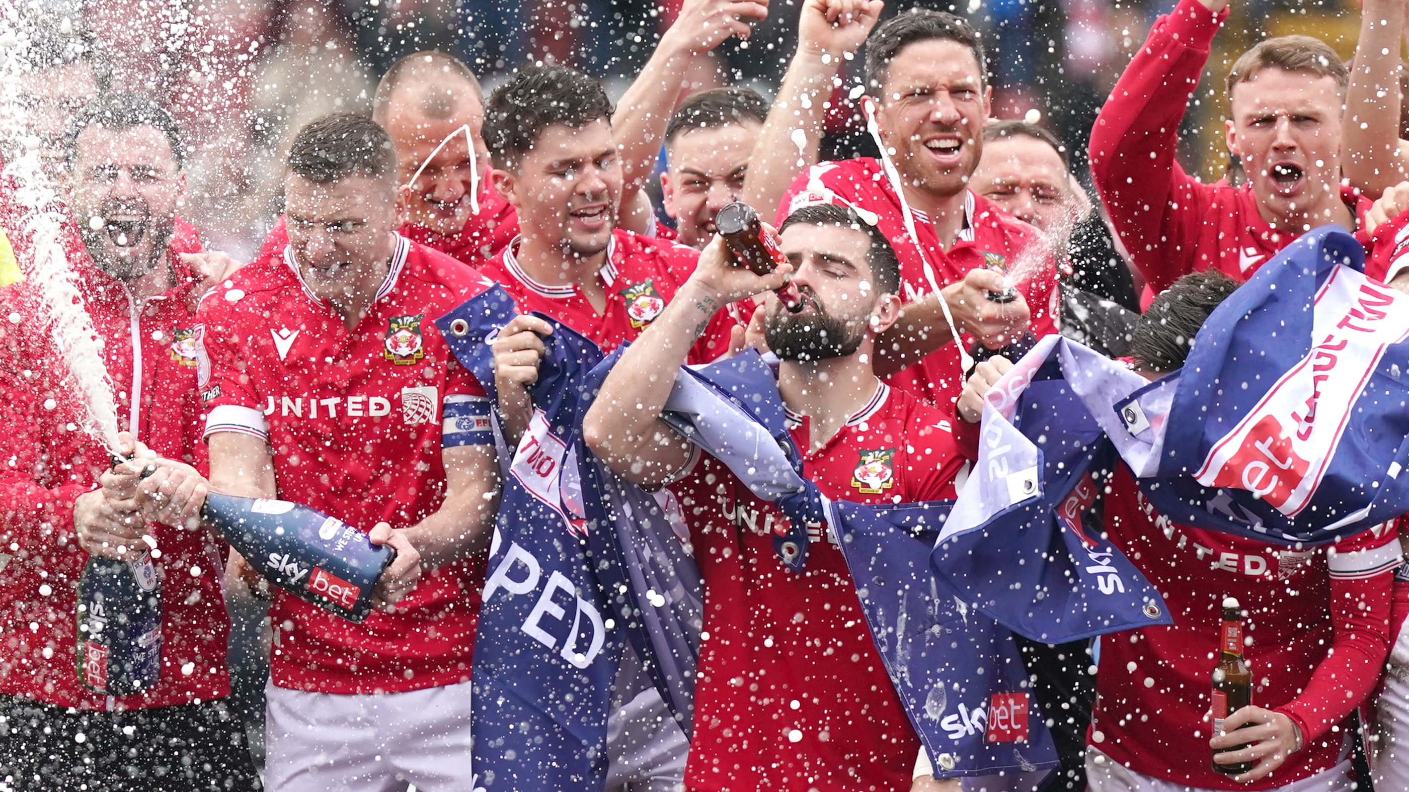 Wrexham AFC's 'unbelievable' promotion will keep community 'progressing ...