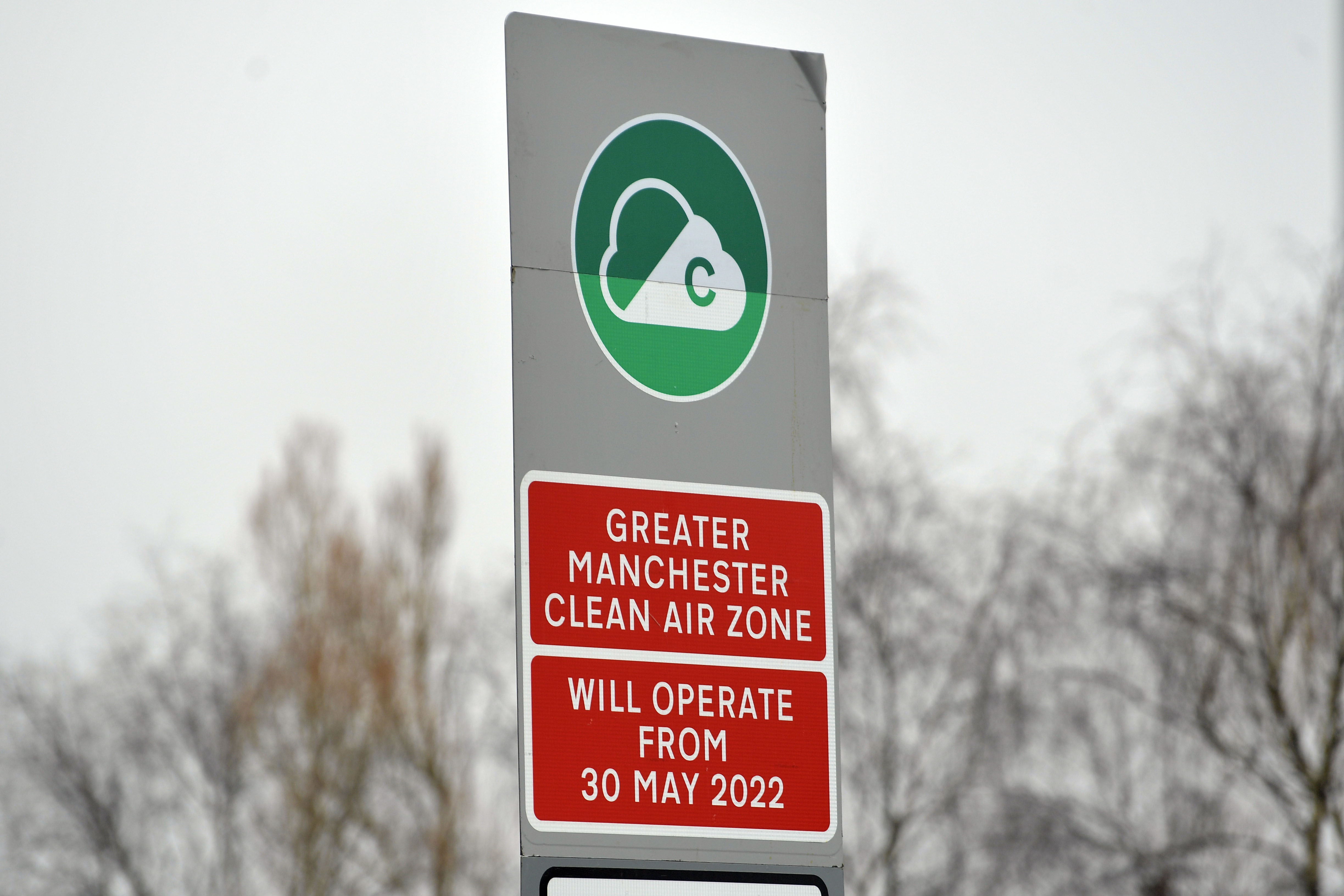 Stickers covering up Greater Manchester's Clean Air Zone signs to cost ...