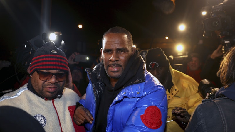 R Kelly arrested after handing himself in to police following sex abuse ...
