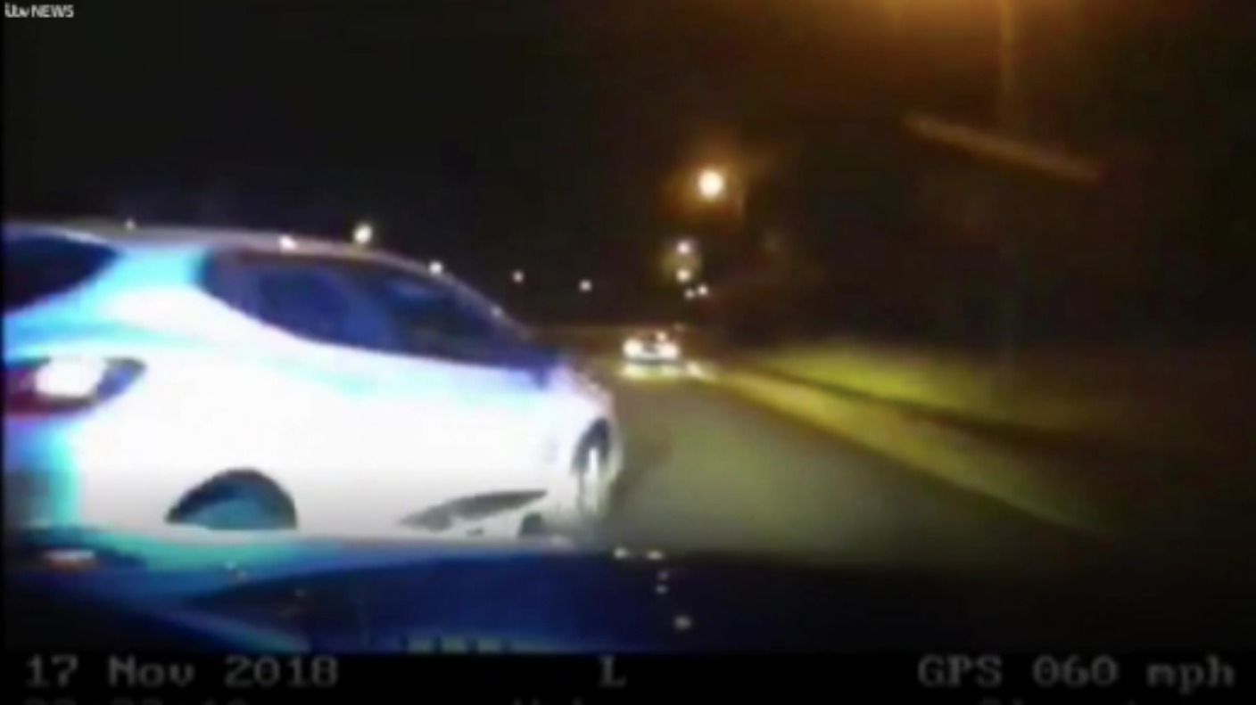 Police ram car off the road in high-speed chase, narrowly avoiding an ...