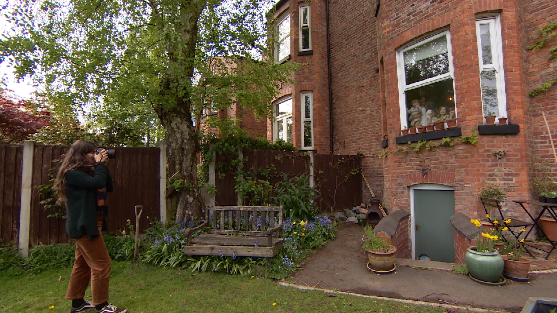 Photographer captures Covid family life through a window | ITV News Granada