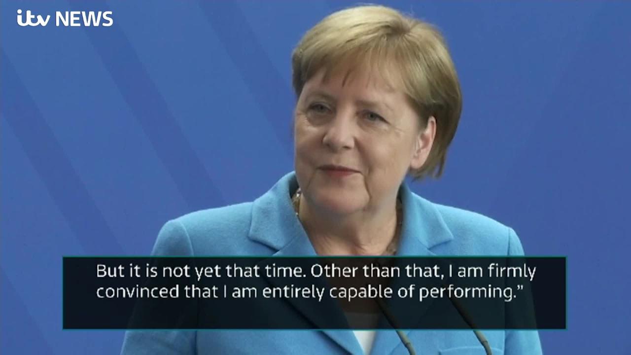 'I'm fine,' German leader Angela Merkel says as she's seen visibly ...
