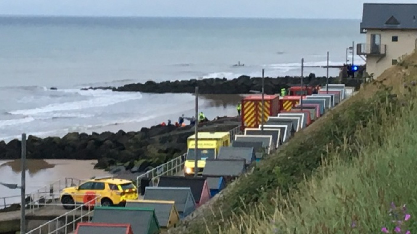 Man trapped in rocks with tide coming in on Norfolk coast saved after ...