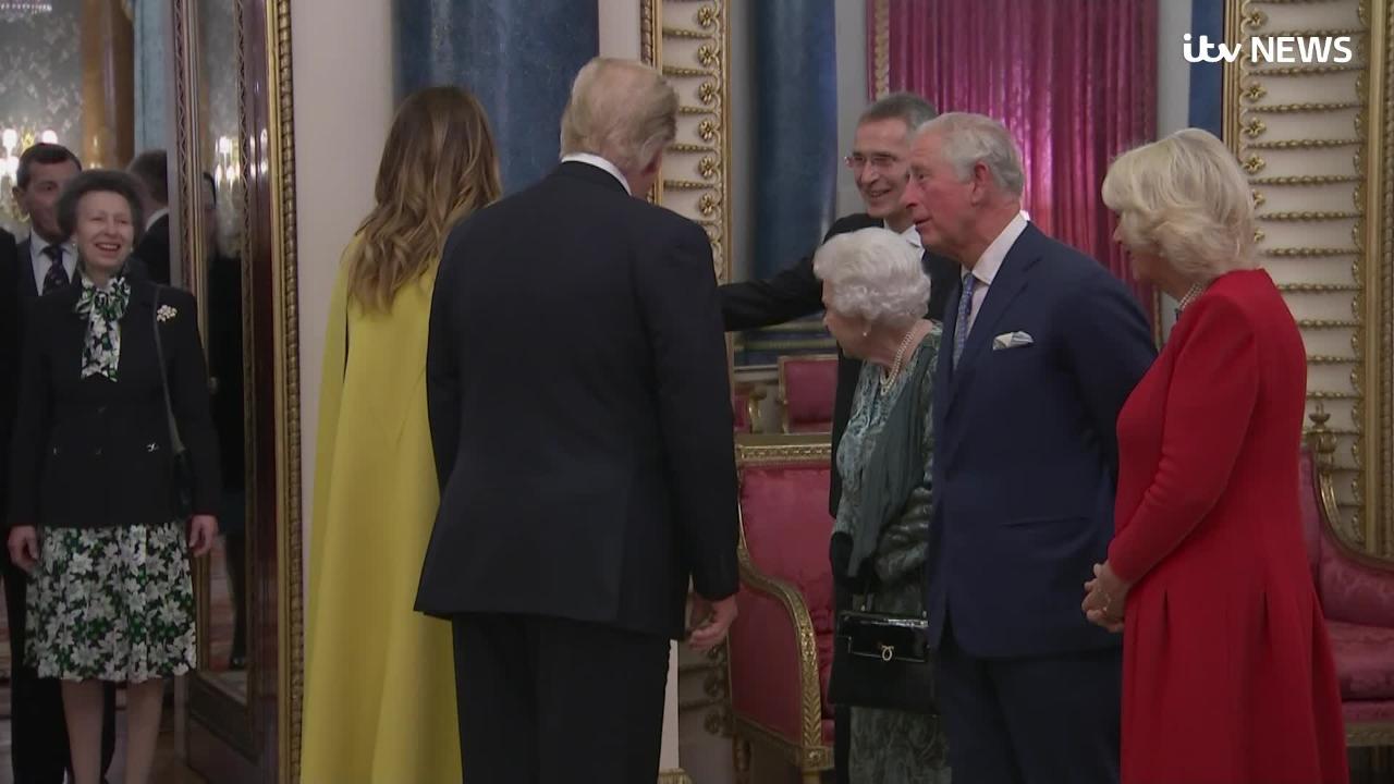 Princess Anne responds with a shrug as the Queen gestures her after ...