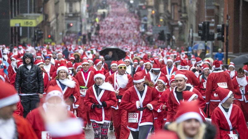 Dashing through the streets as Santas run for charity | ITV News