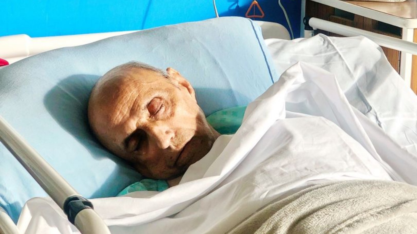 Hospital apologises after patient, 82, was 'forced to lie in his own ...