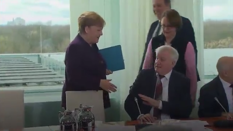 Angela Merkel handshake rejected as coronavirus cases reach 150 in ...