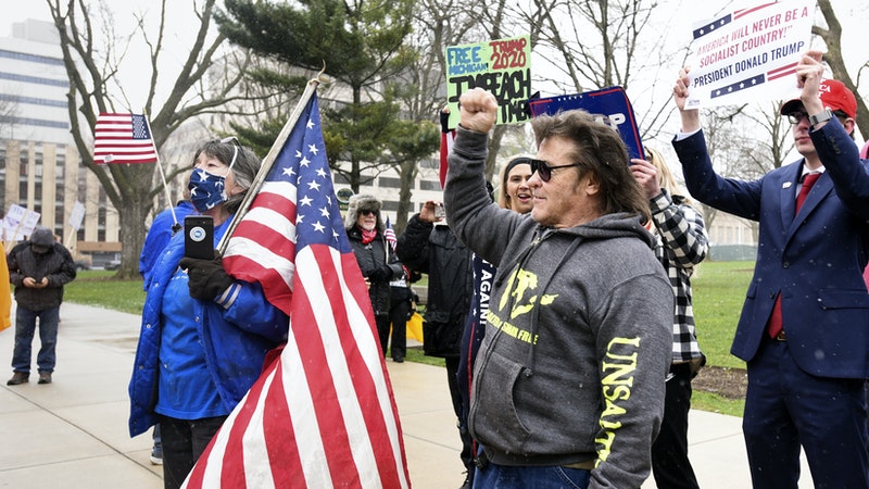 Hundreds protest over Michigan governor’s social distancing order | ITV ...