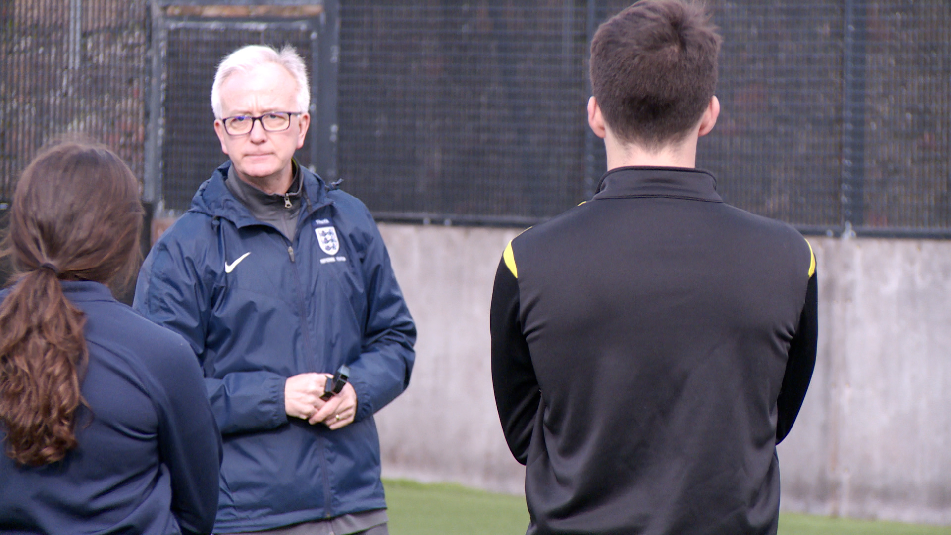Former Premier League match official teaches Jersey's next generation ...