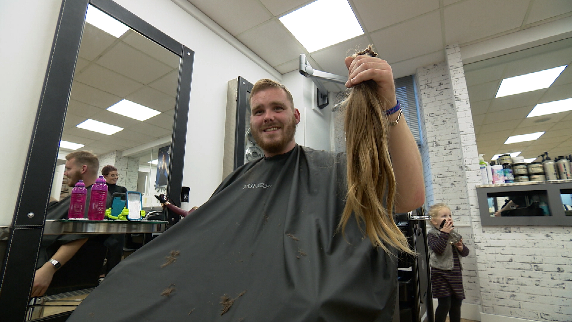 Islander has lockdown locks lopped off for charity | ITV News Channel
