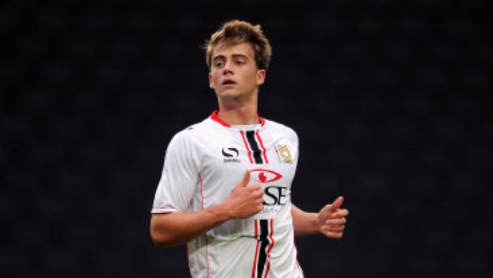 MK Dons manager Karl Robinson optimistic that club can deal with ...