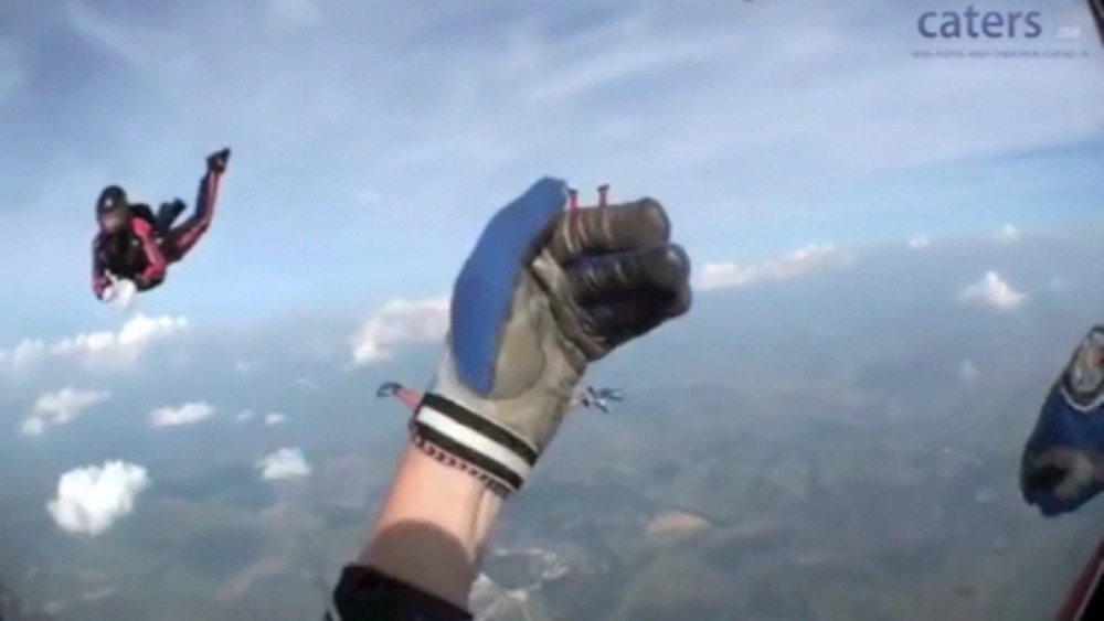 Skydiver rescued mid-air after being knocked unconscious in freak ...
