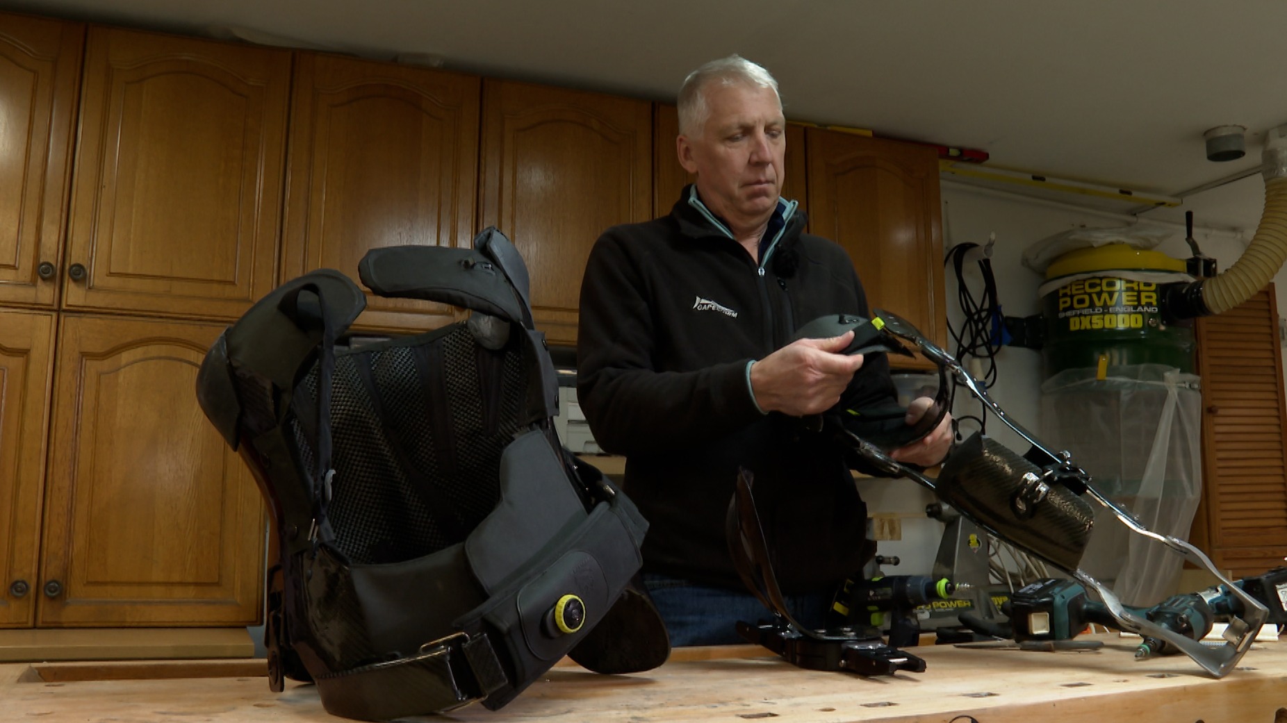 Man builds world's first 'exoskeleton' to help wife walk after cancer ...