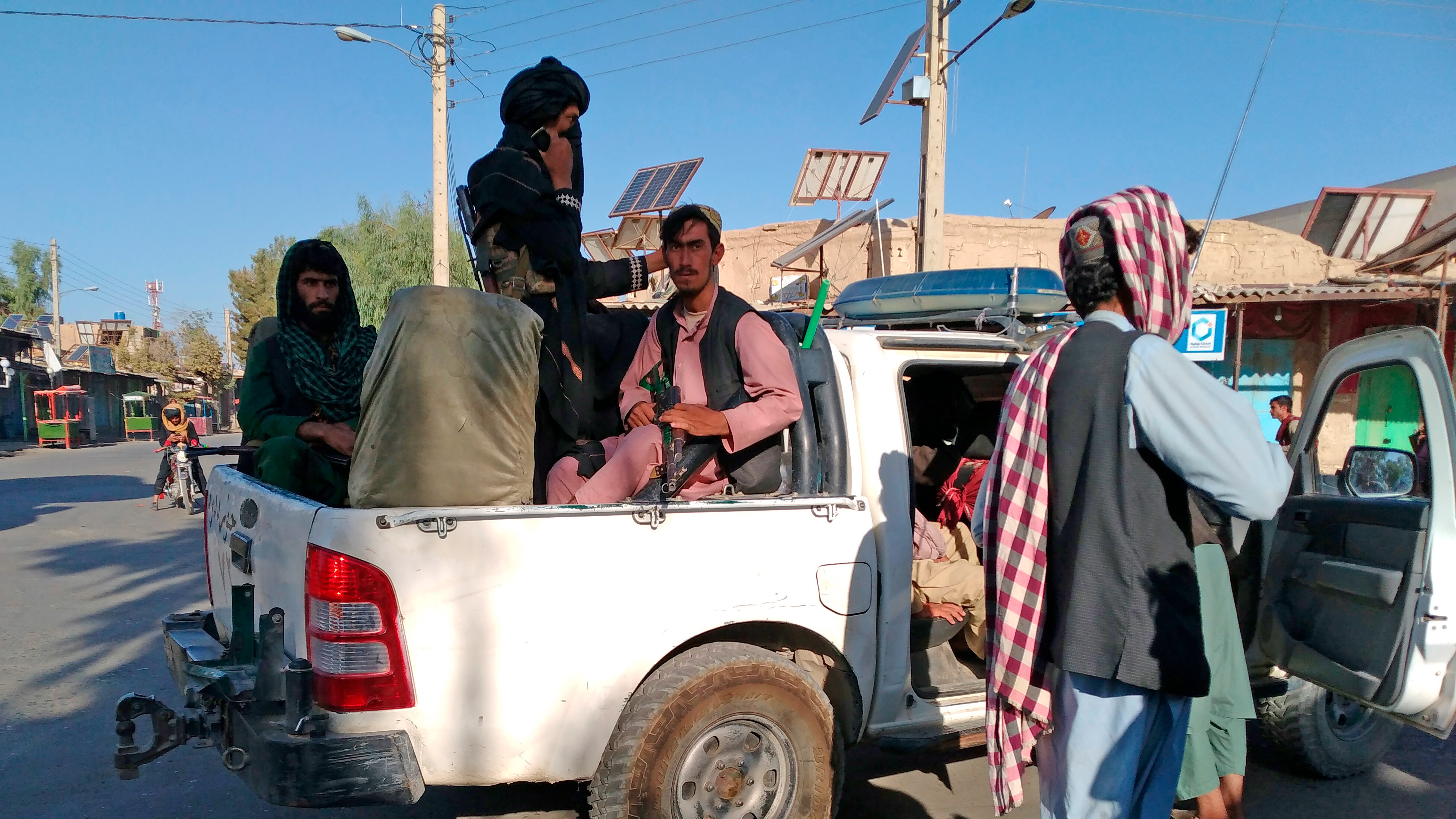 Taliban seize three more provincial capitals and key military base from ...
