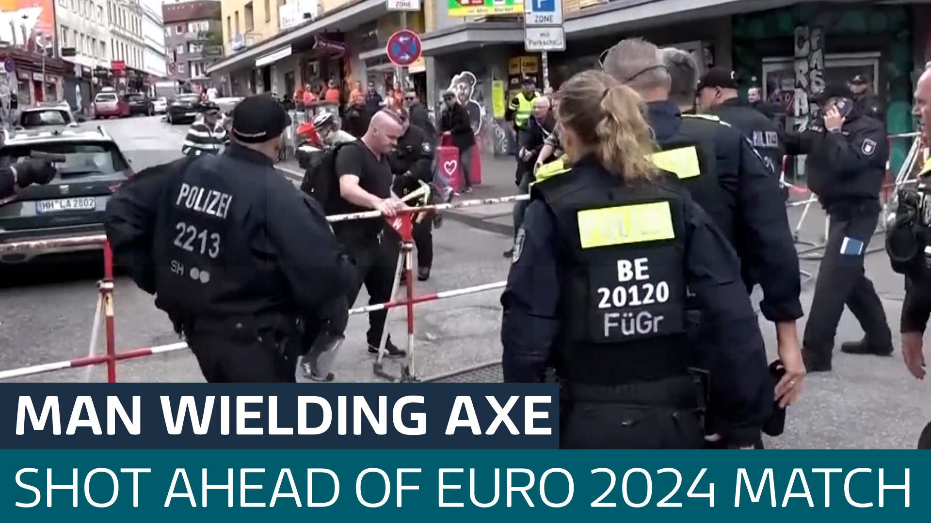 Man wielding 'axe and incendiary device' shot by police in Hamburg ...