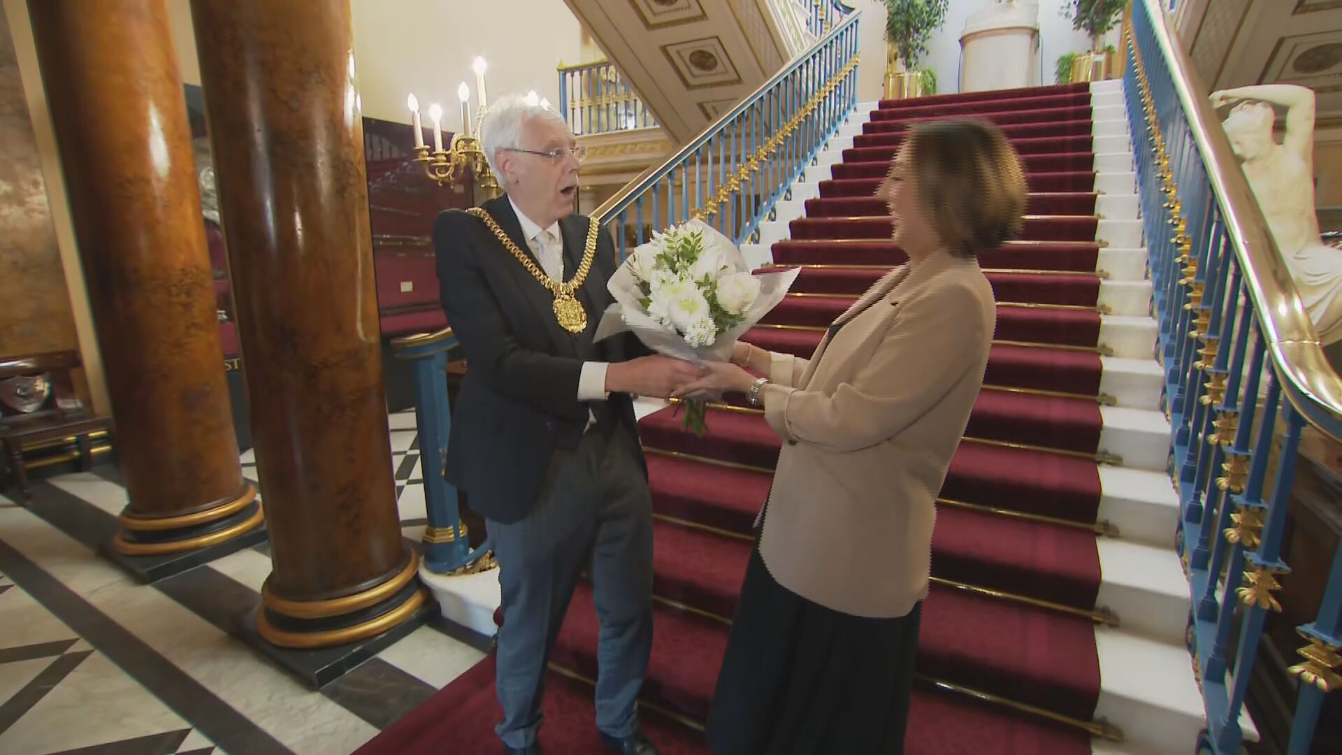 Woman who raised £250,000 for library set on fire in riots is formally ...