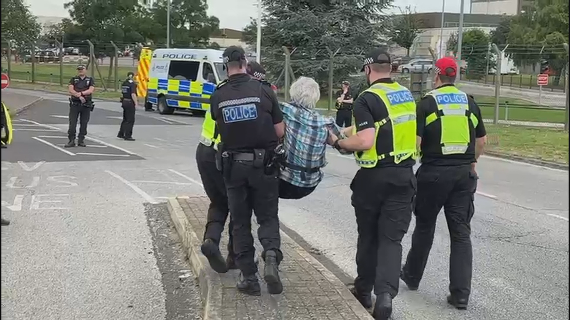 Veteran peace campaigners arrested during anti-nuke protest outside RAF ...
