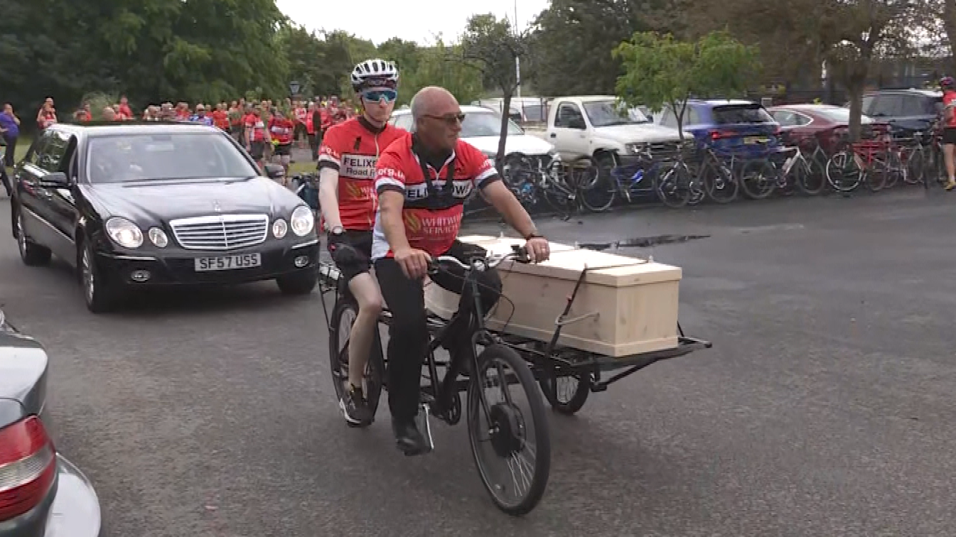 Parkrun stalwart's coffin arrives by tandem as hundreds gather for ...