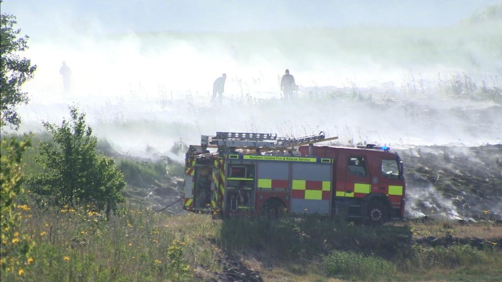 Northern Ireland Fire Service battle gorse fire at Giant's Park in ...