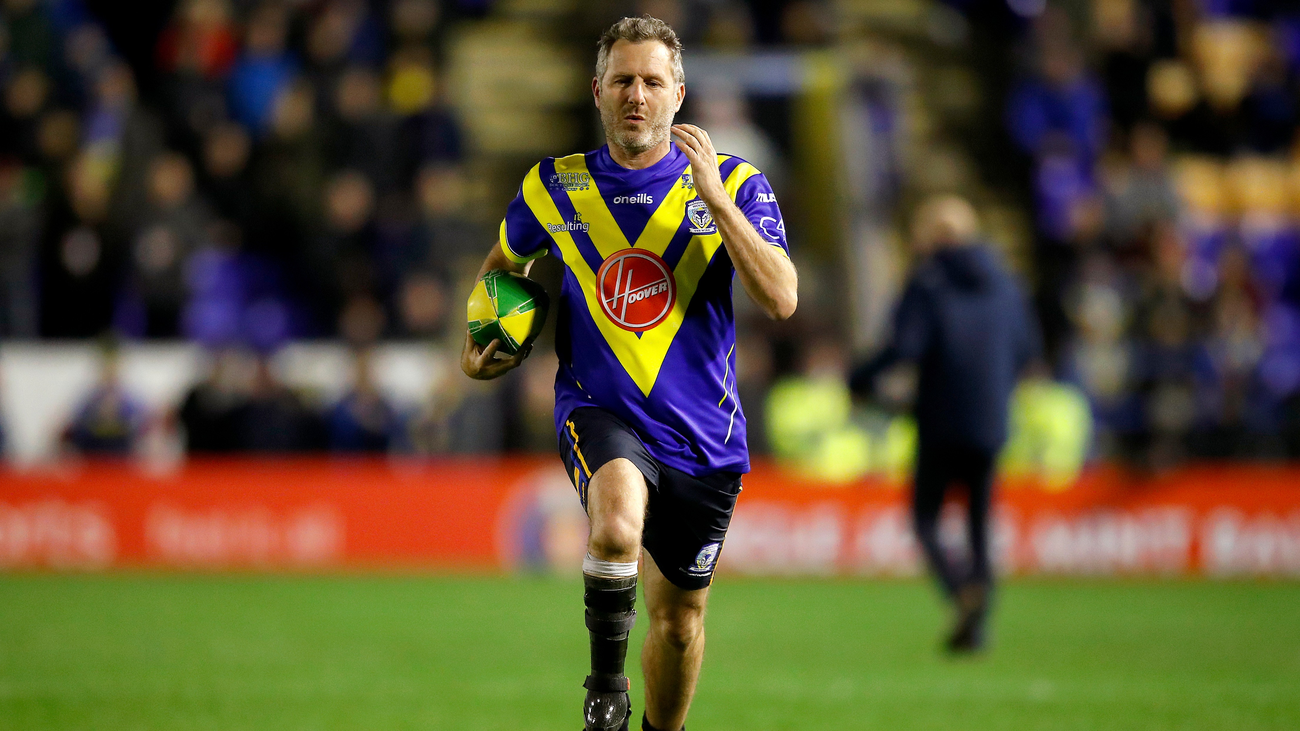 Comedian Adam Hills joins Warrington rugby teammates to help tackle ...