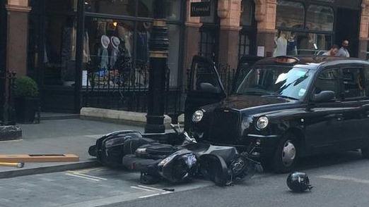 Undercover police pin down and arrest a would-be robber outside luxury ...