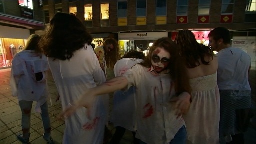 Zombies walk through St Helier for Autism | ITV News Channel