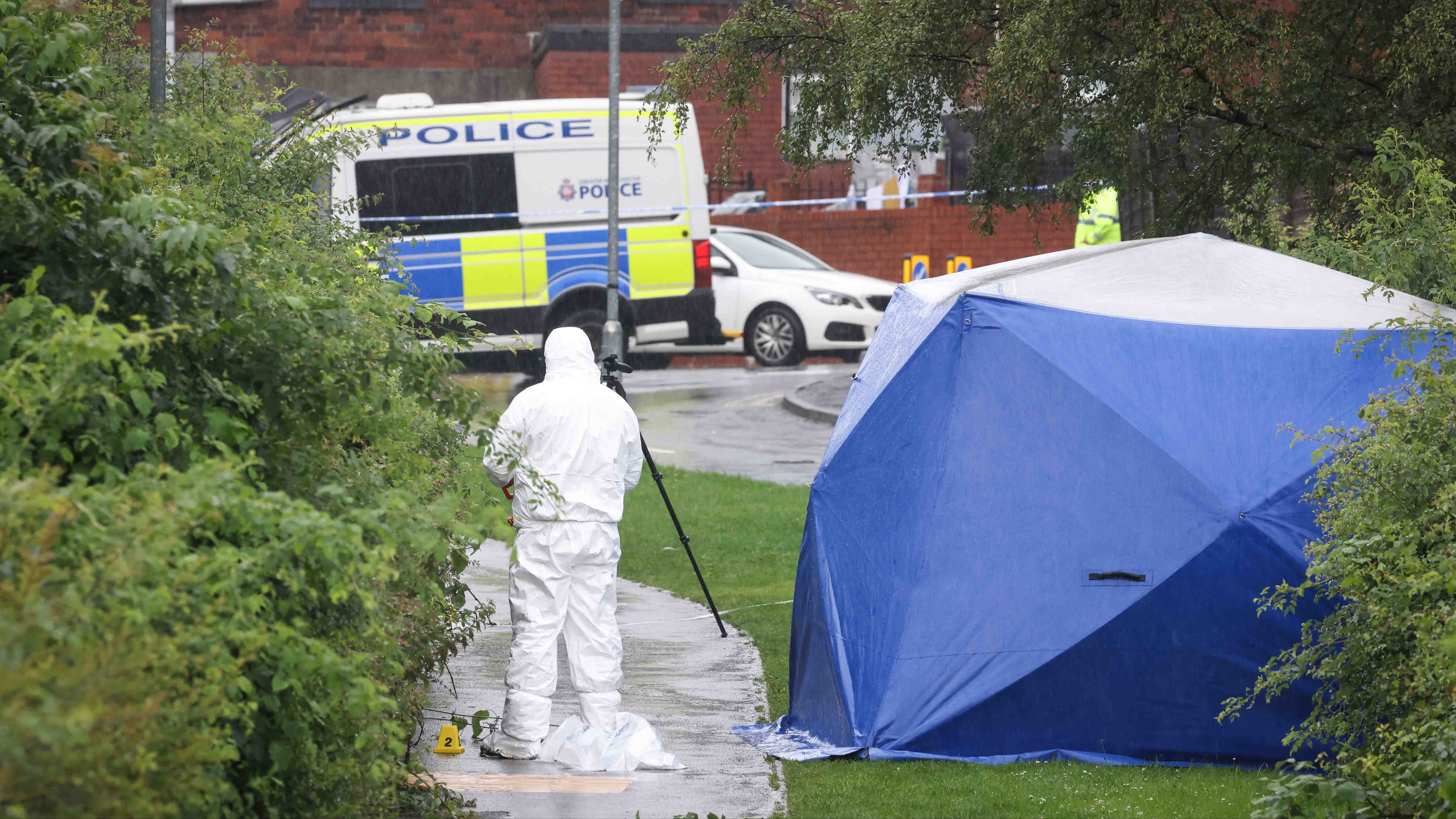 Two arrested on suspicion of murder after body of mum found on Rochdale ...