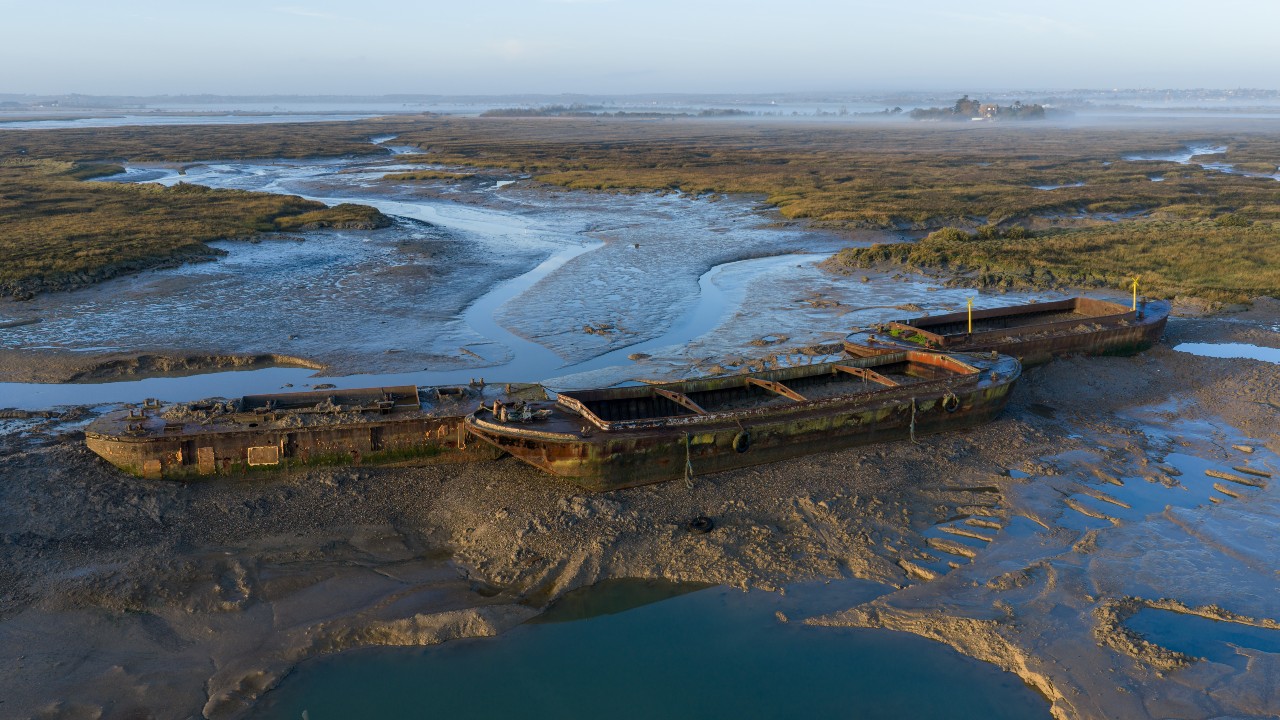National Trust sinks three barges in Blackwater Estuary in Essex to ...