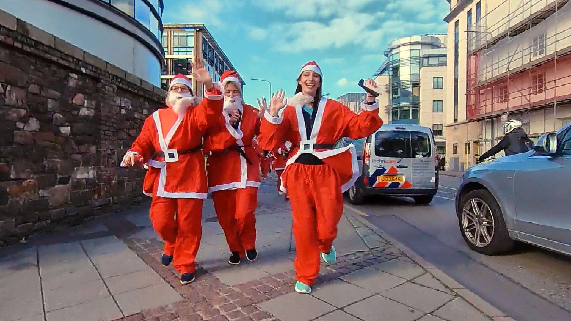 Hundreds of Santas take to the streets to raise money for Jersey ...