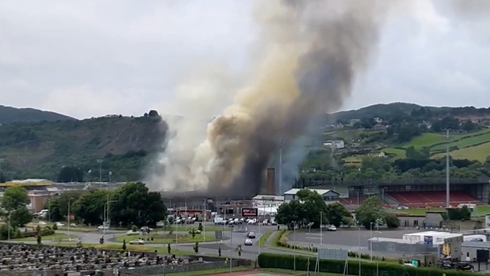 Fire Service battles large blaze in Greenbank Industrial Estate in ...