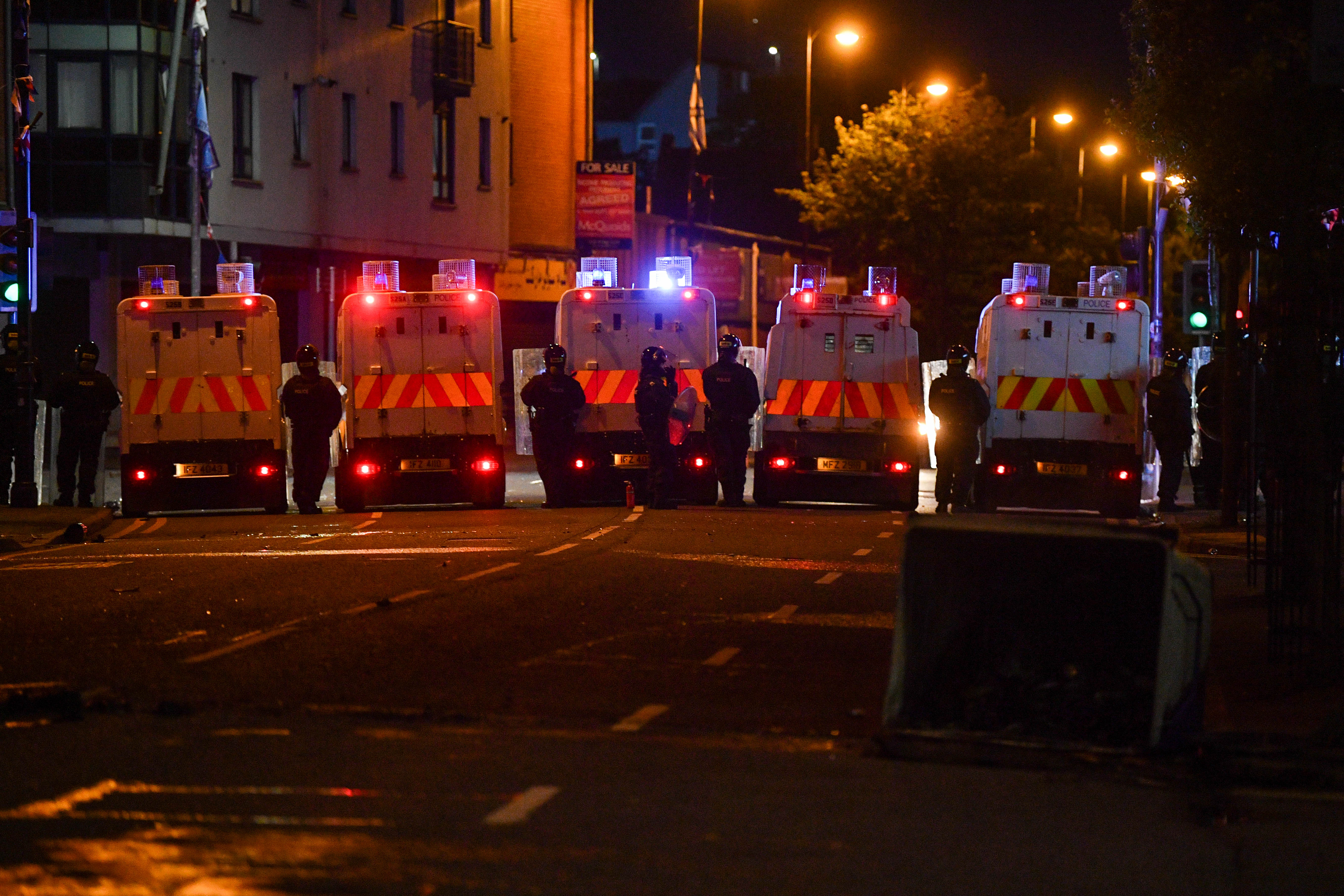 Four men charged over violence after anti-immigration protests in ...