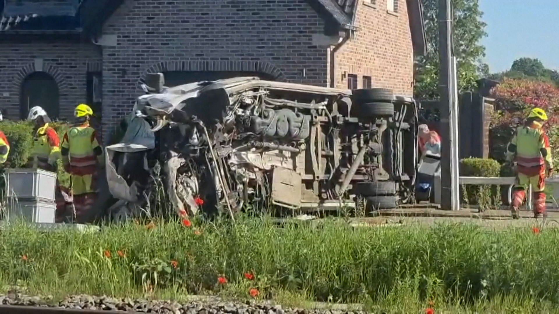 Two children among four dead after school bus hit by train in Belgium ...