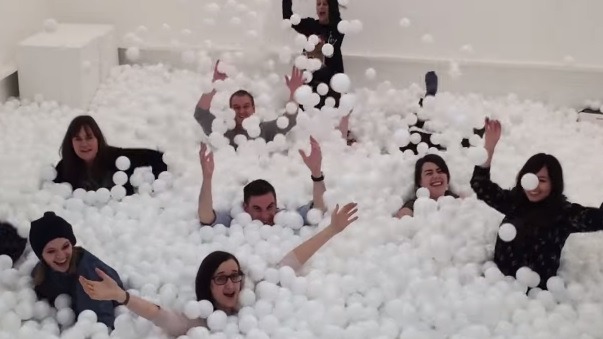 Pit filled with 80,000 balls helps stressed out workers relax | ITV ...