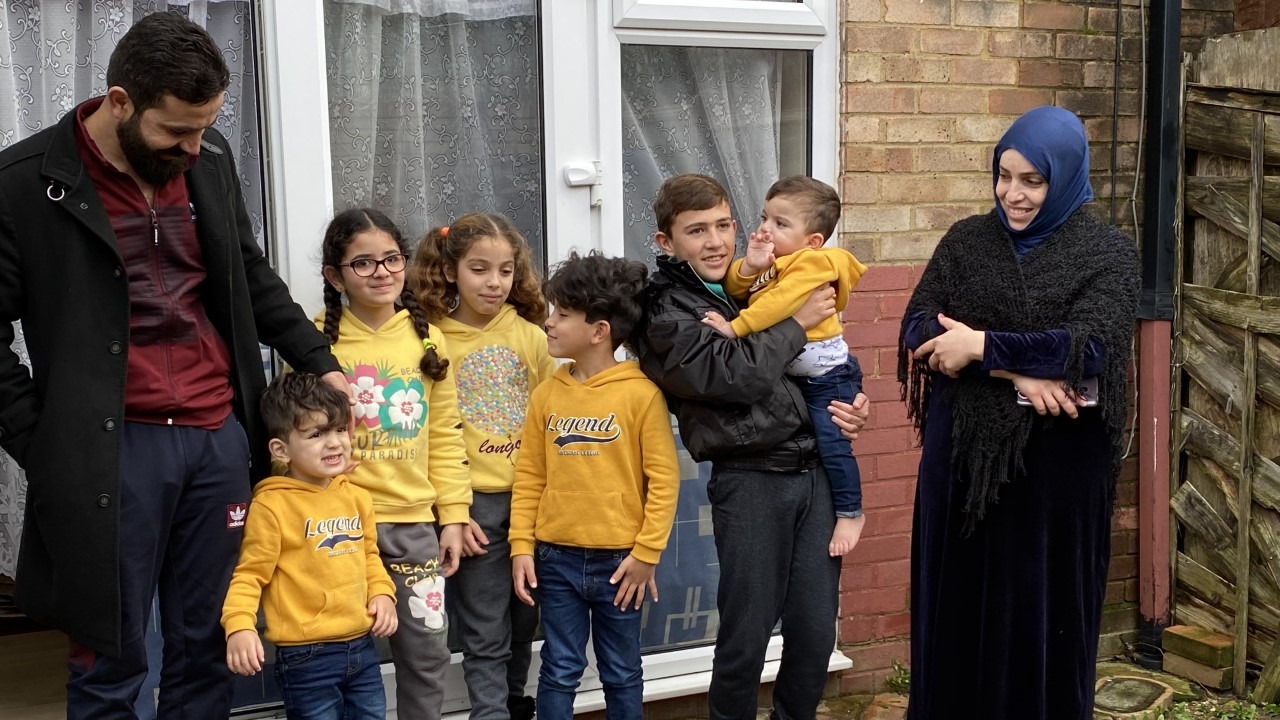 Syrian refugee, 11, reunited with his British family after more than a ...