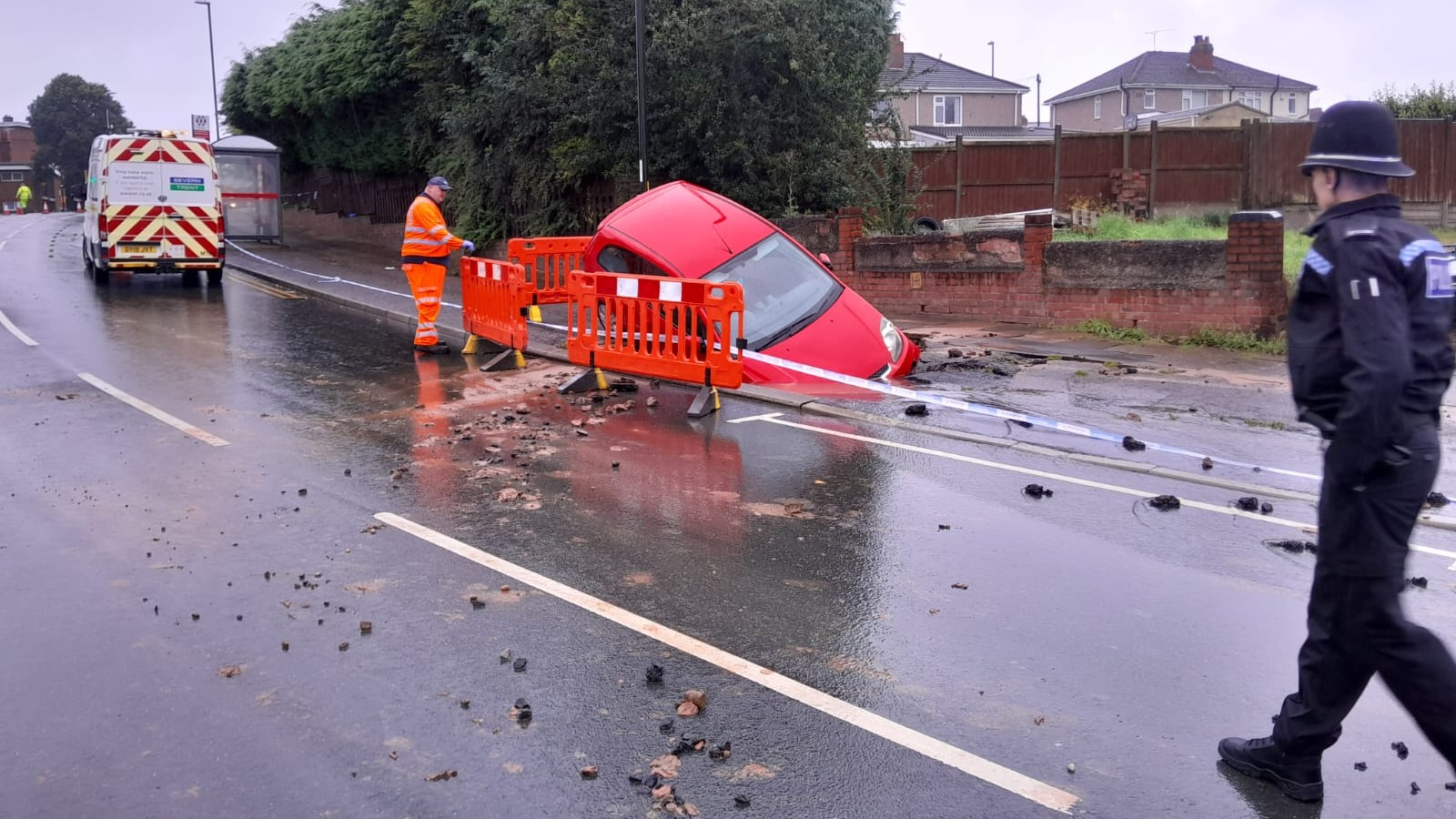 Sinkhole swallows up paramedic's car on Coventry road | ITV News Central
