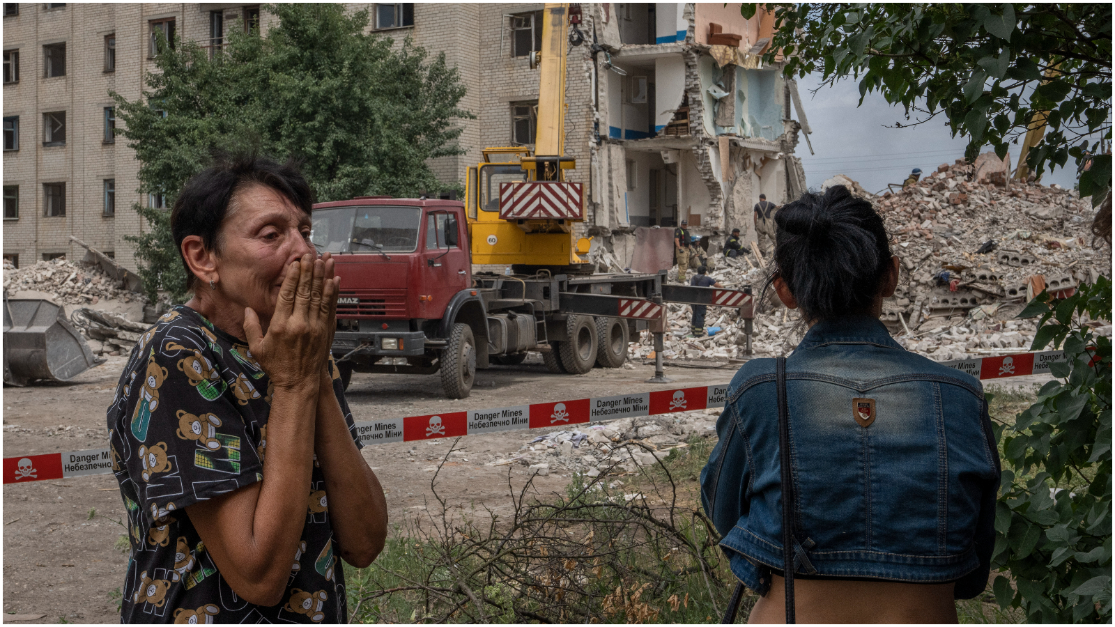 At least 15 dead and up to 20 buried under rubble as Russian missile ...