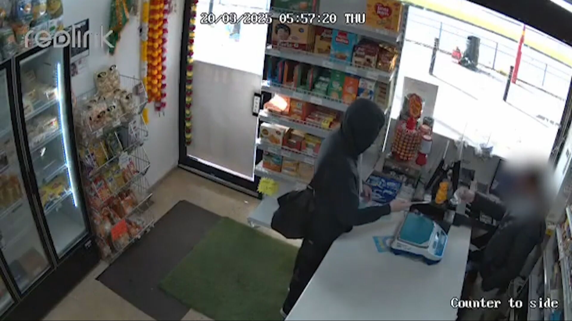 Shop owner left scared in new footage showing robbery at knifepoint ...