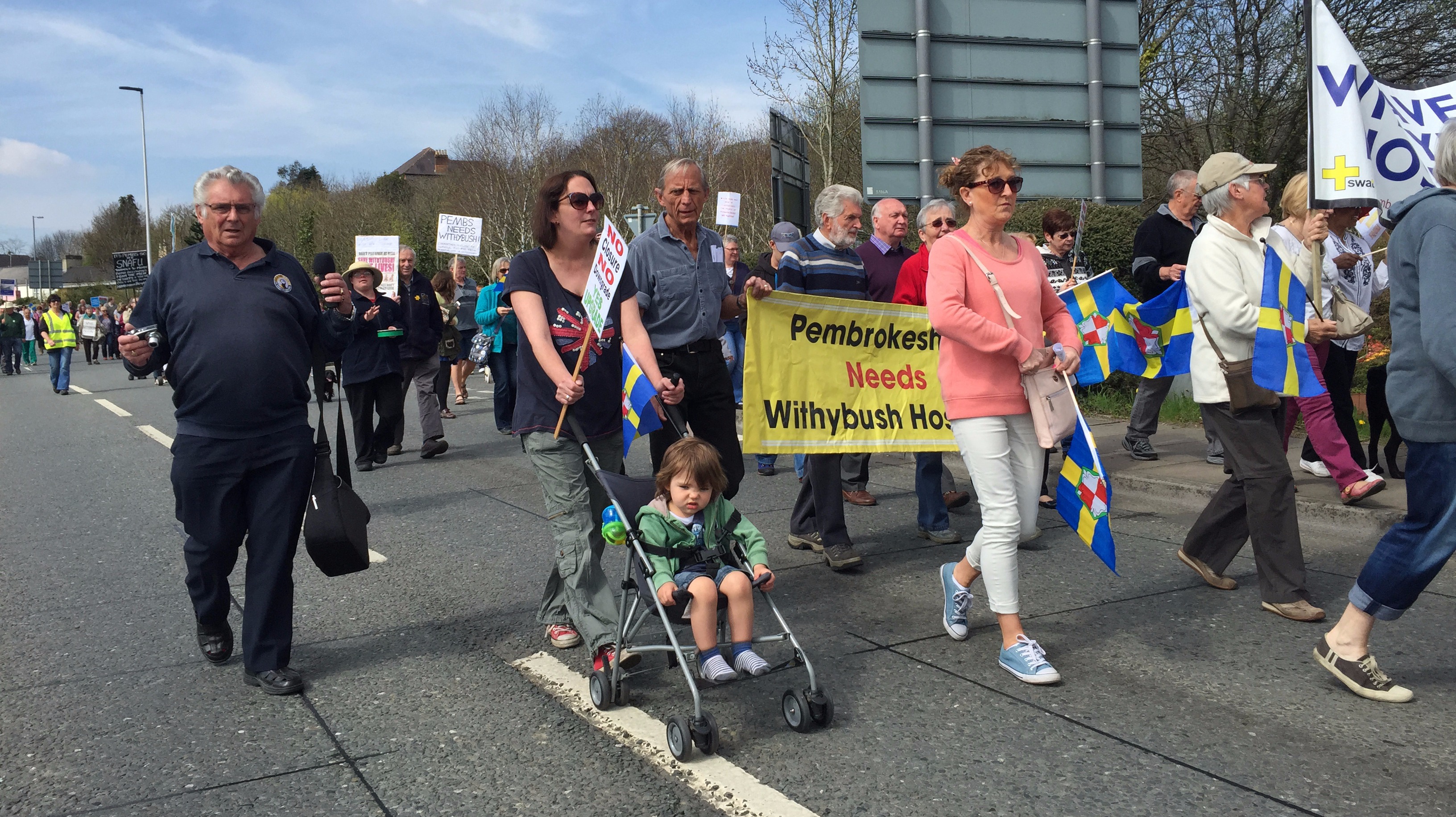 Hundreds turn out for hospital protest march | ITV News Wales