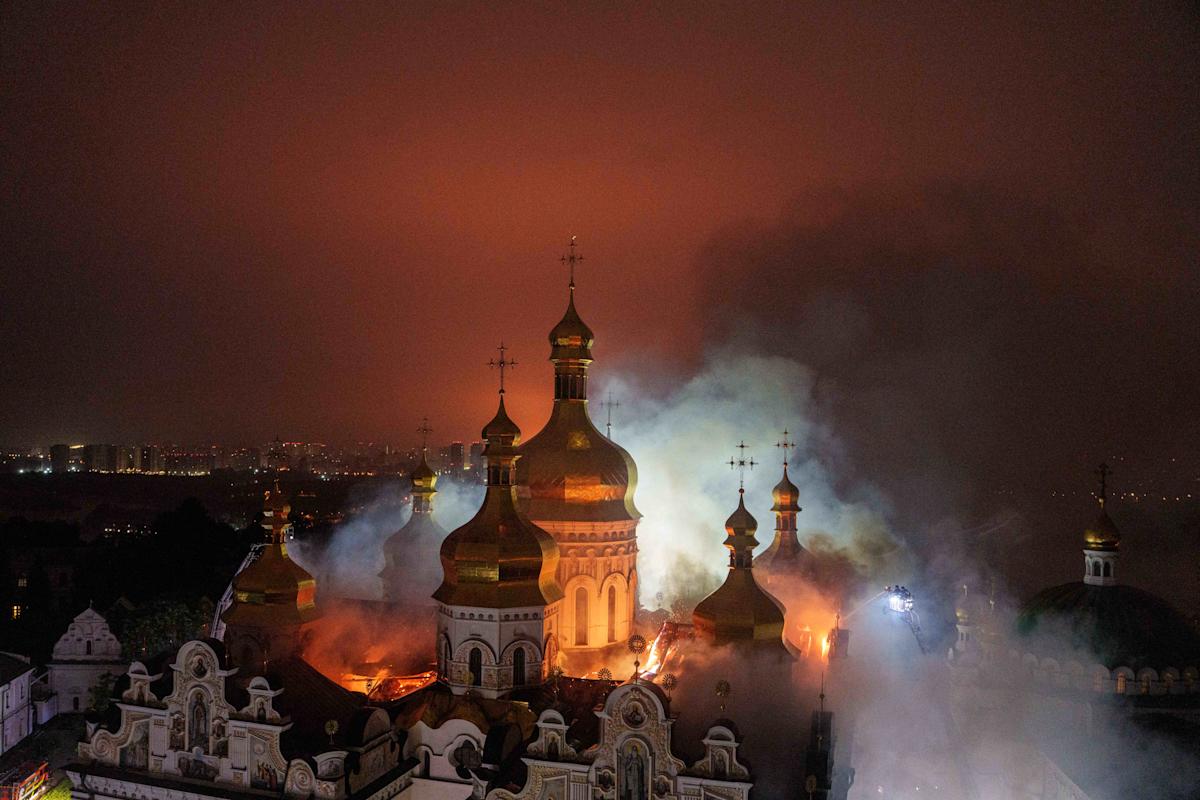 Historic religious site on fire and five dead as Russia strikes Ukraine ...