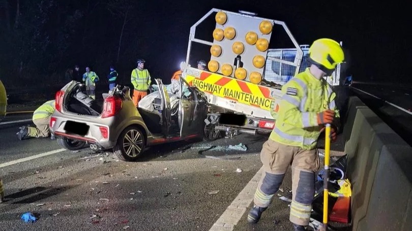 Driver cut free after crash with stationary National Highways van near ...