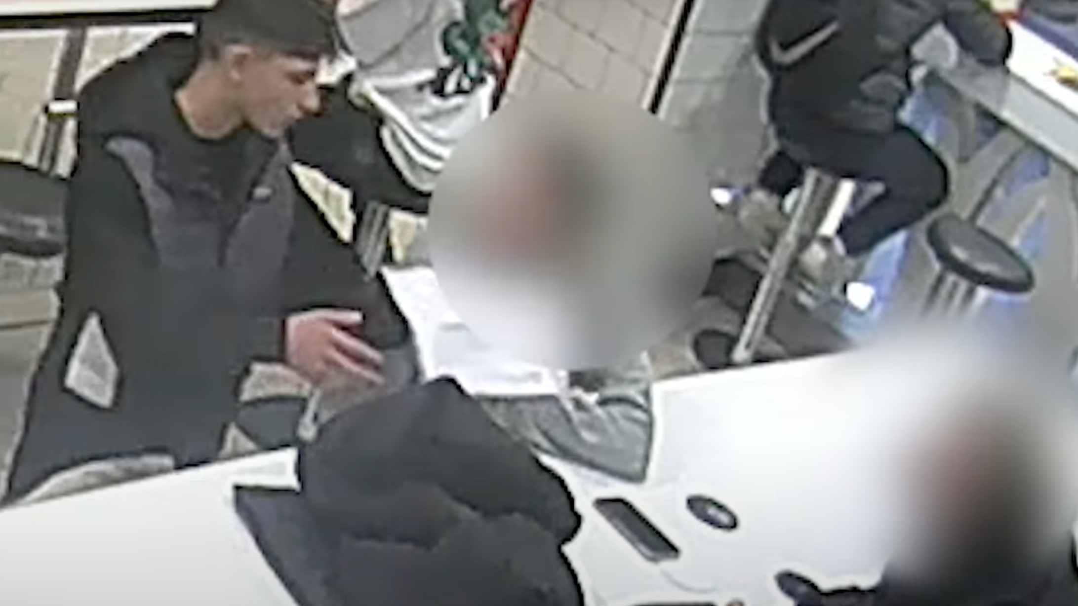 CCTV footage shows the moment phone thief uses a sheet of paper to ...