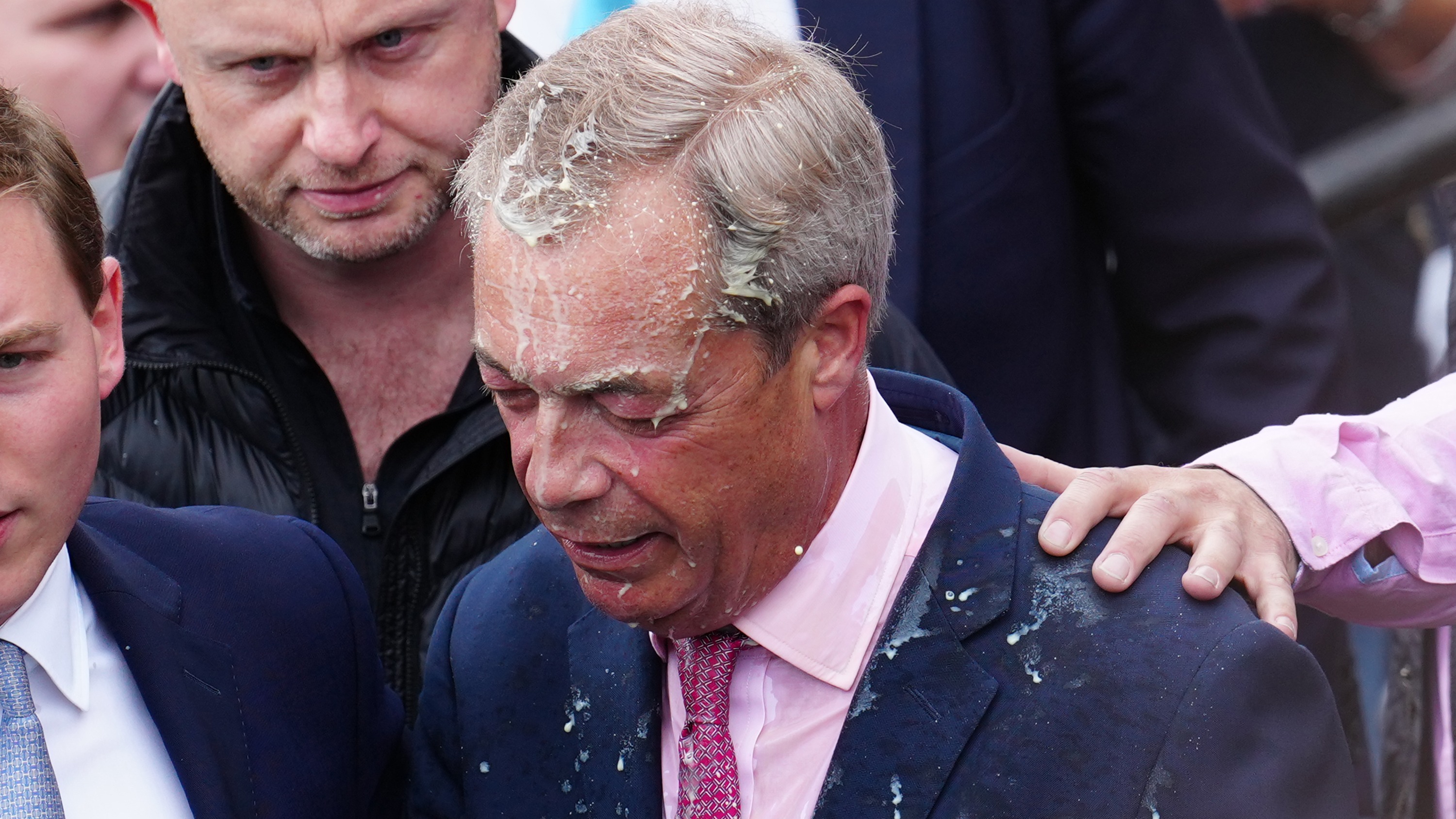 Woman, 25, charged after milkshake thrown at Reform UK leader Nigel ...